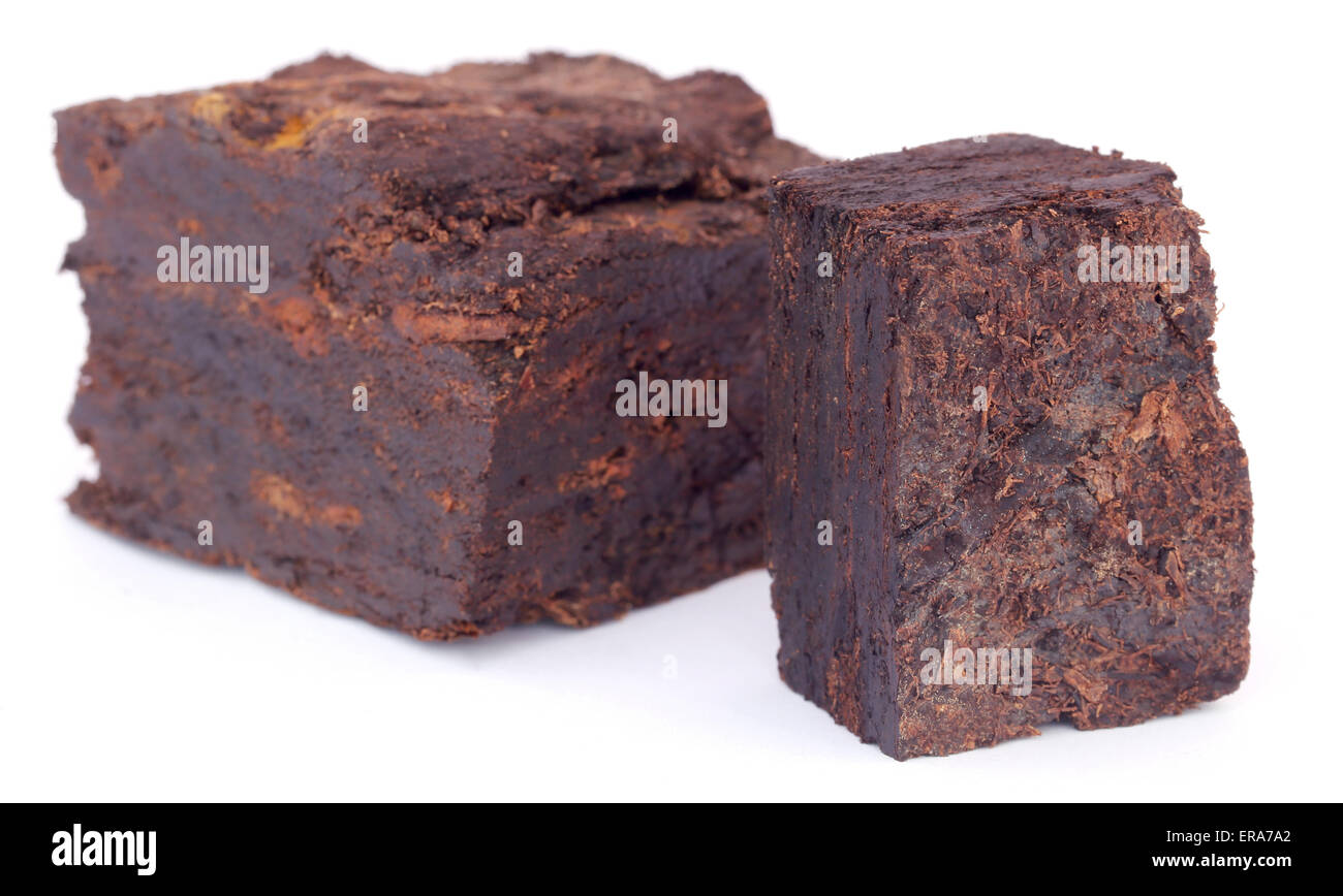 Close up of peat block over white background Stock Photo - Alamy