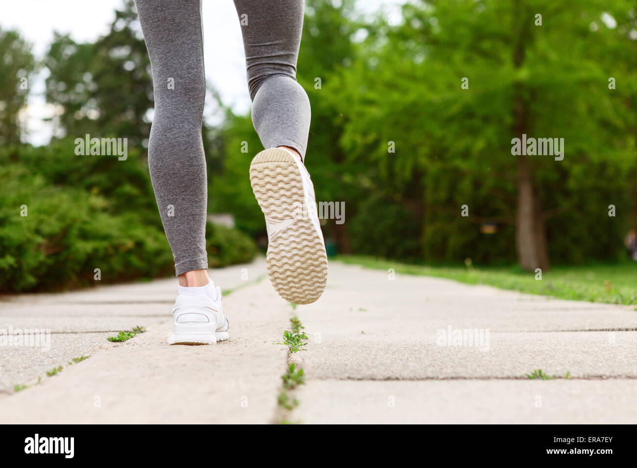 Close up of running woman Stock Photo - Alamy