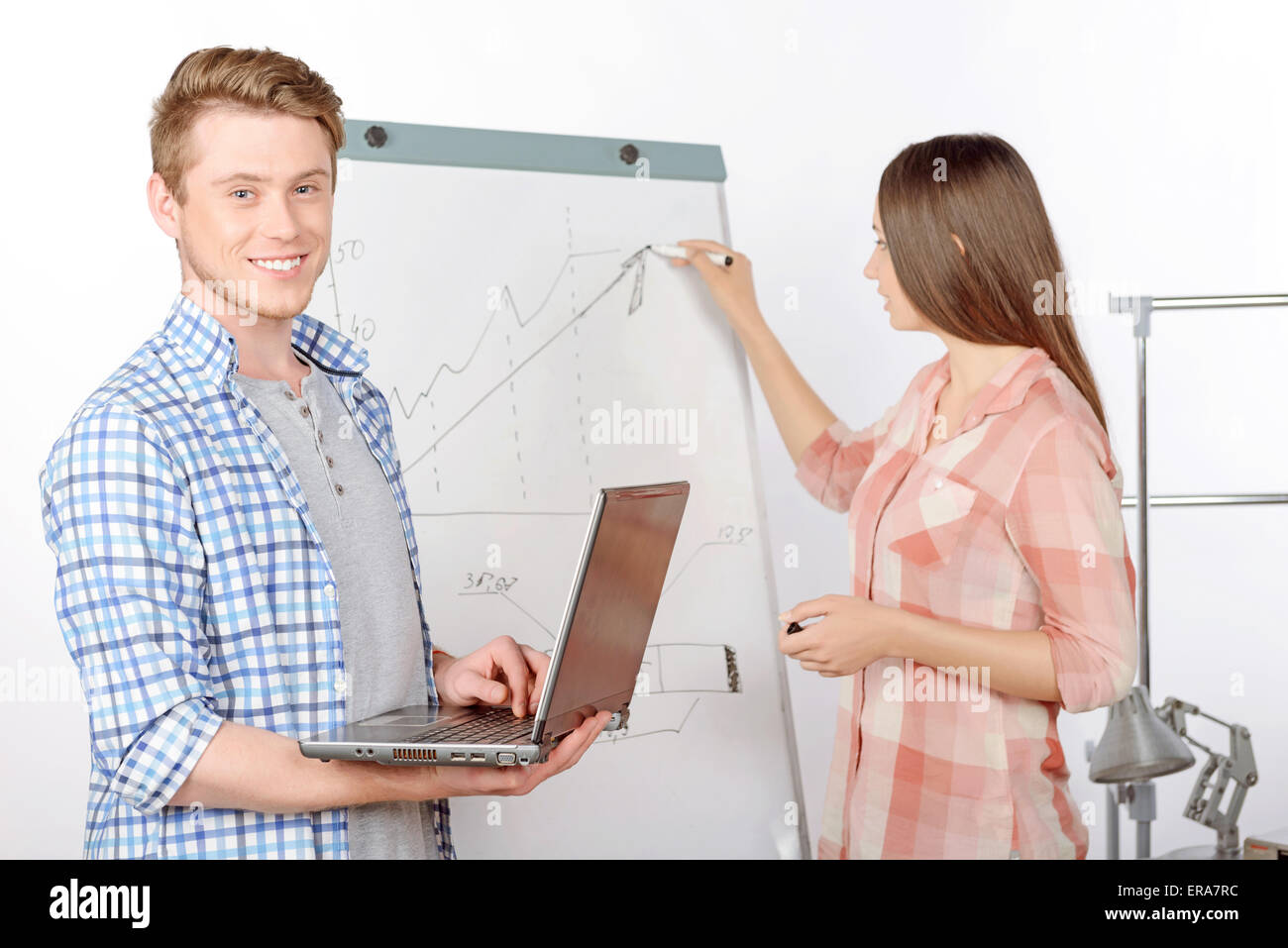 Two students working in laboratory Stock Photo - Alamy