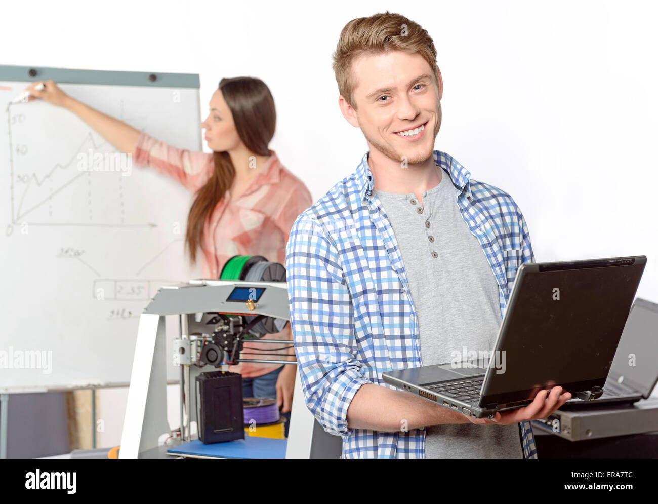 Two students with three-dimensional printer Stock Photo - Alamy