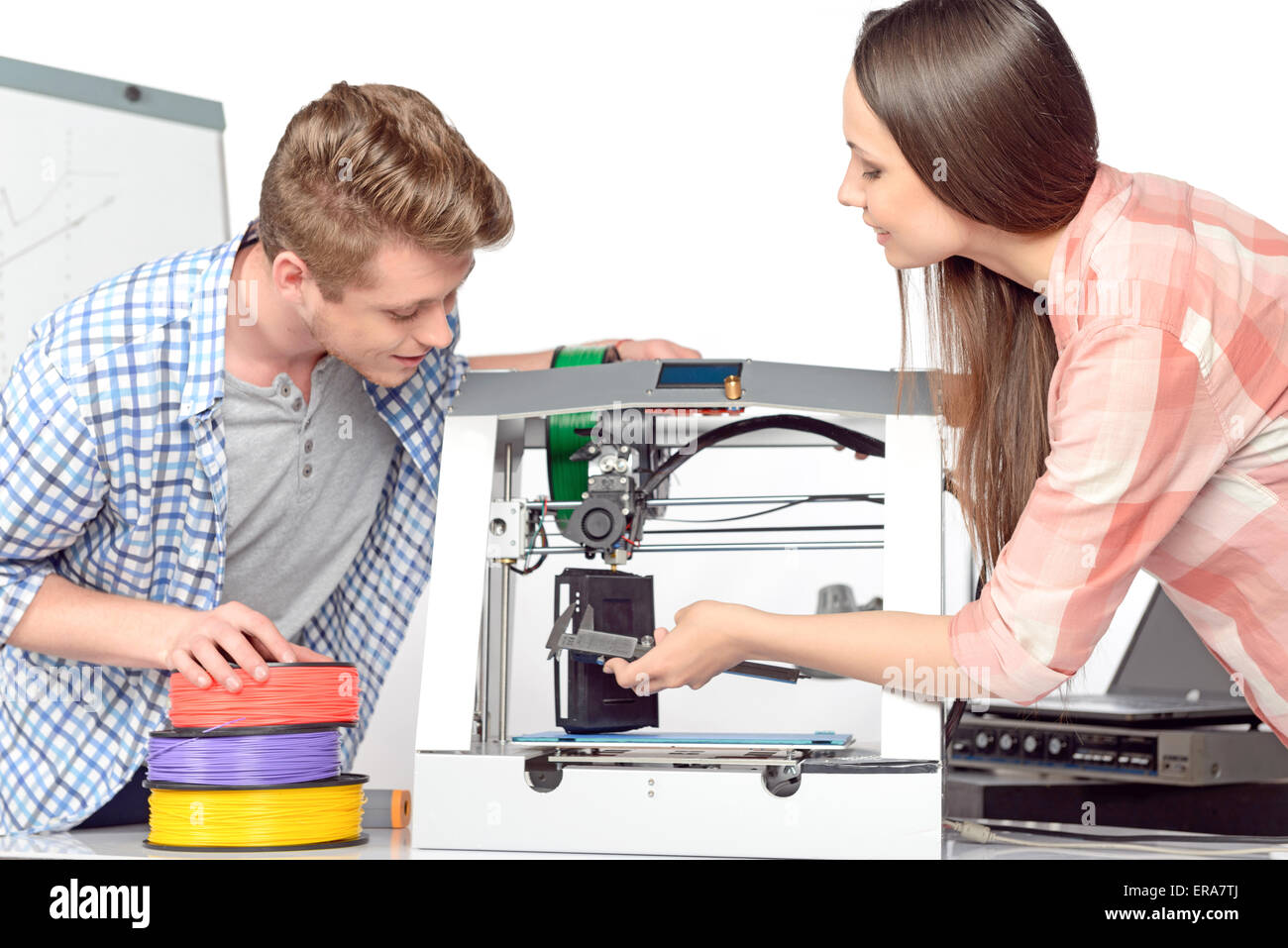 Two students with three-dimensional printer Stock Photo - Alamy