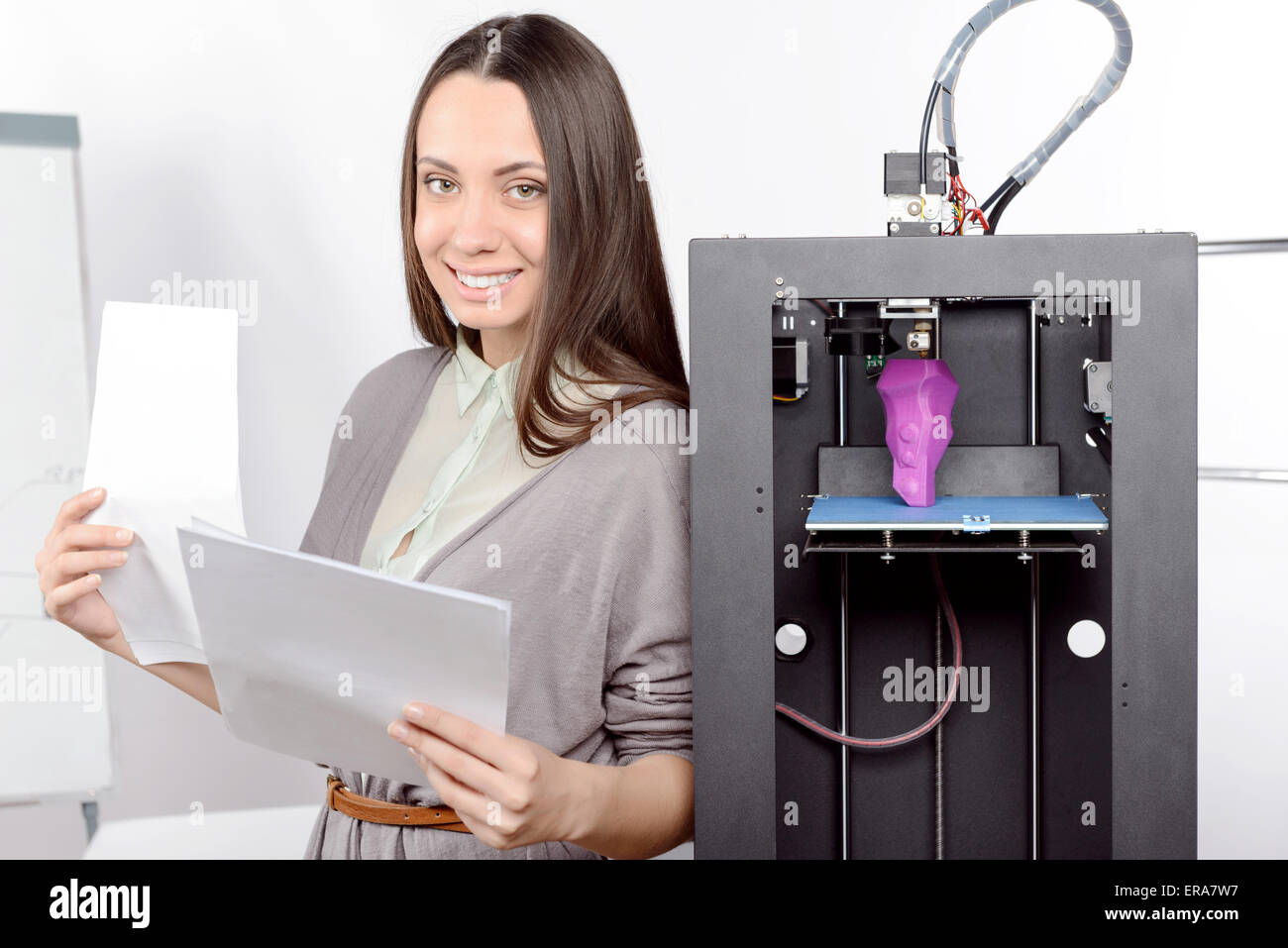 Beautiful girl with three-dimensional printer Stock Photo - Alamy