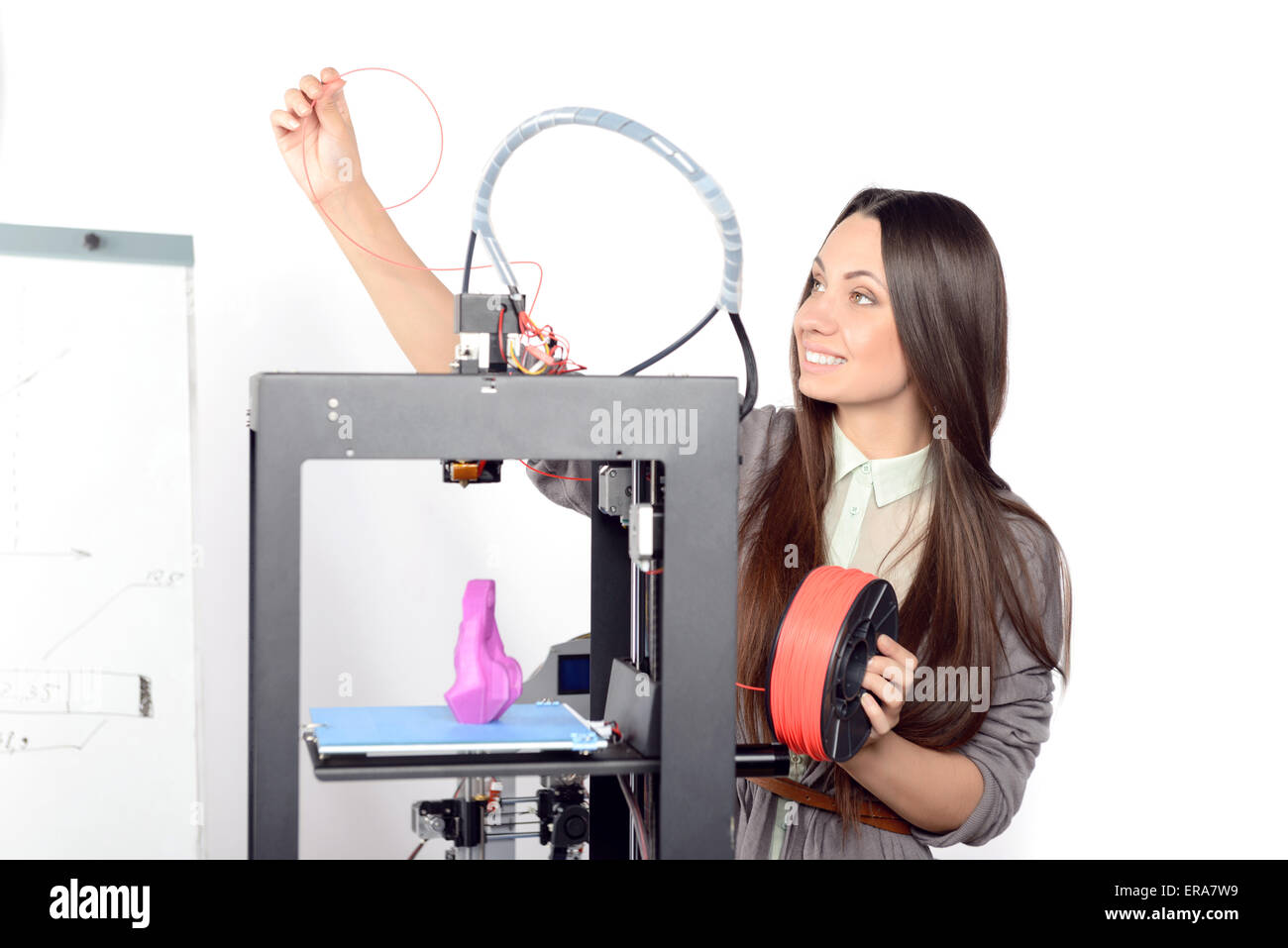 Beautiful girl with three-dimensional printer Stock Photo - Alamy
