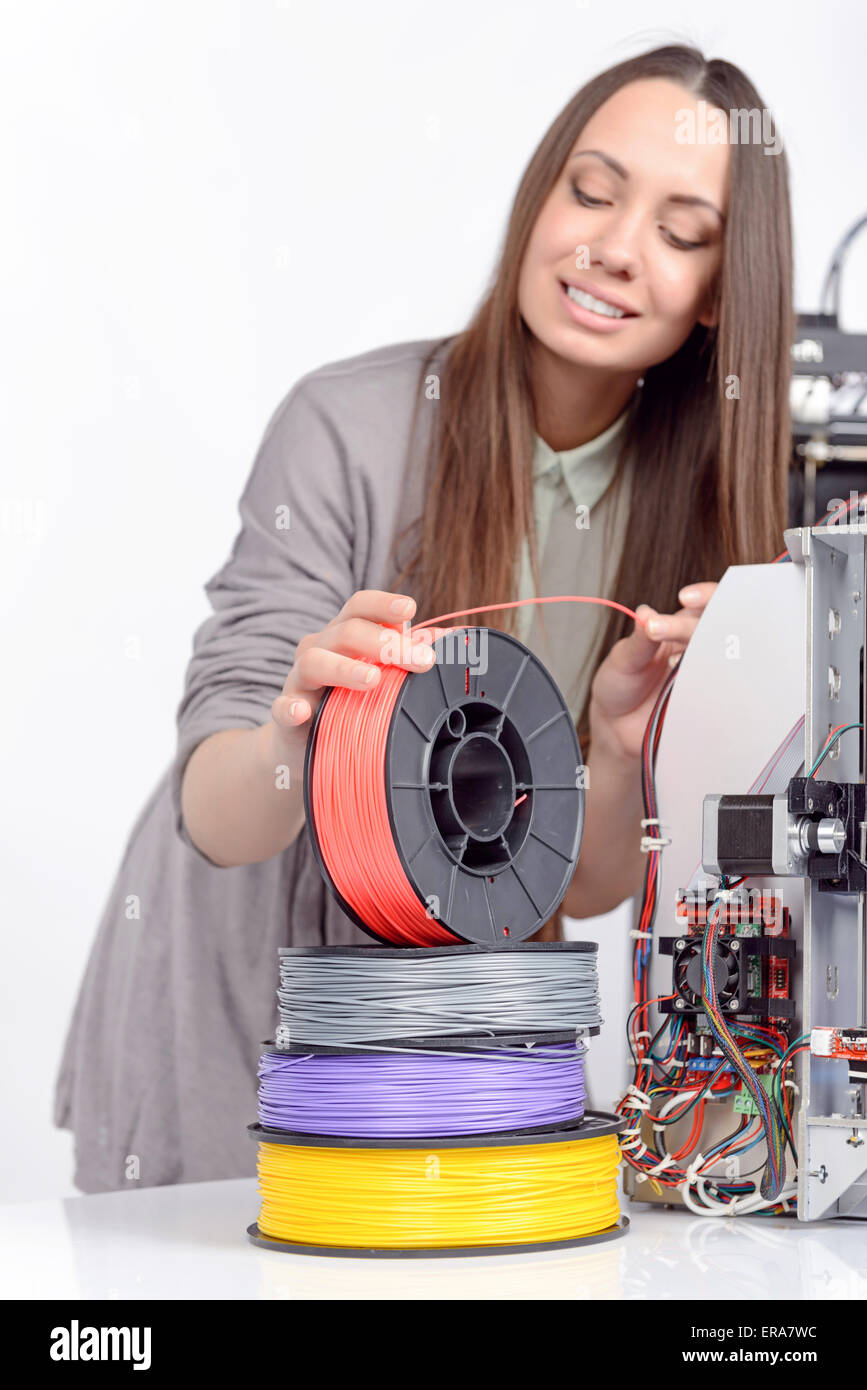 Beautiful girl with three-dimensional printer Stock Photo - Alamy