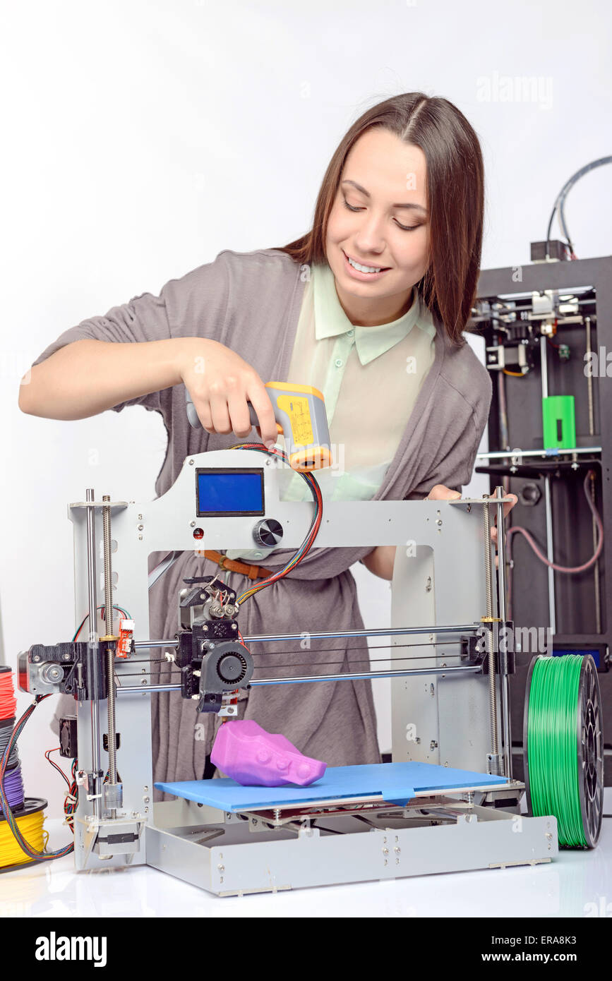 Beautiful girl with three-dimensional printer Stock Photo - Alamy