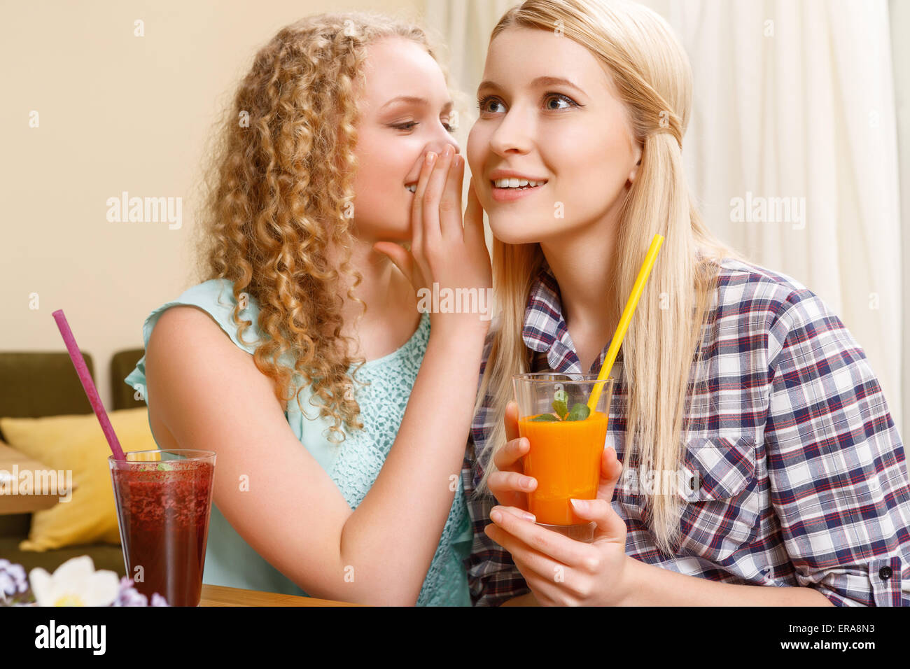 Telling secrets hi-res stock photography and images - Alamy