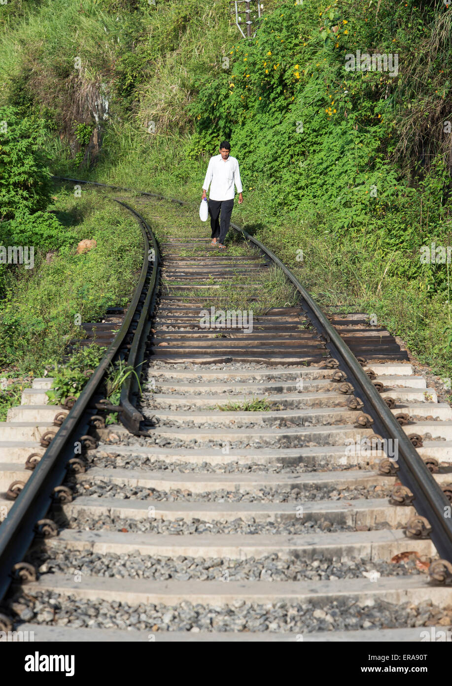 Man walking on rail track hi-res stock photography and images - Alamy