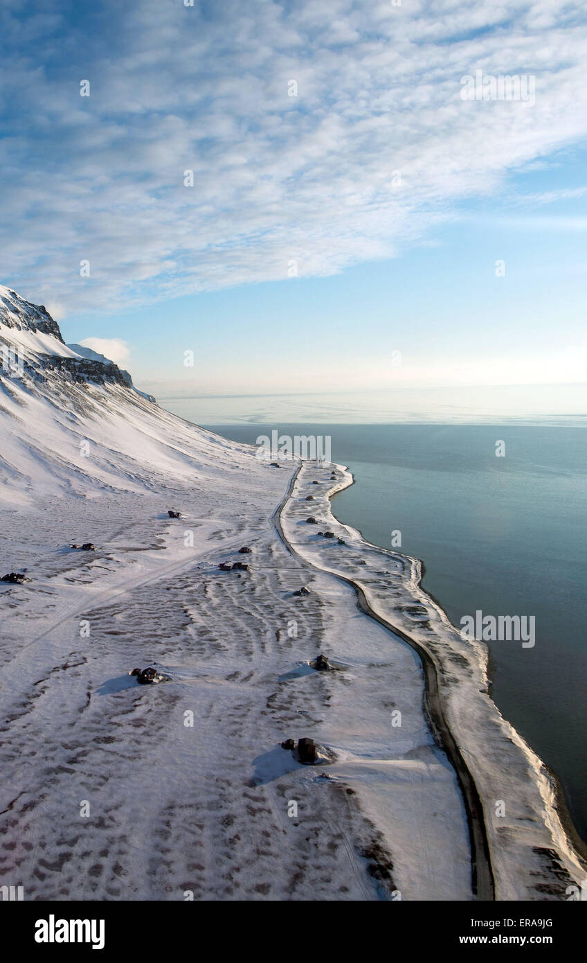 Snow-covered mountains are pictured during a flight across Spitsbergen ...