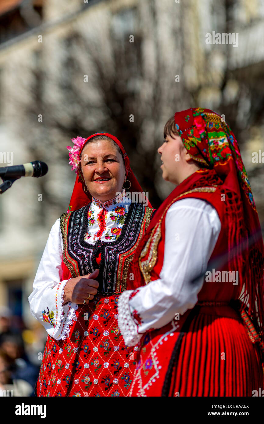 Two Bulgarian folklore singers performing a folklore song during the ...