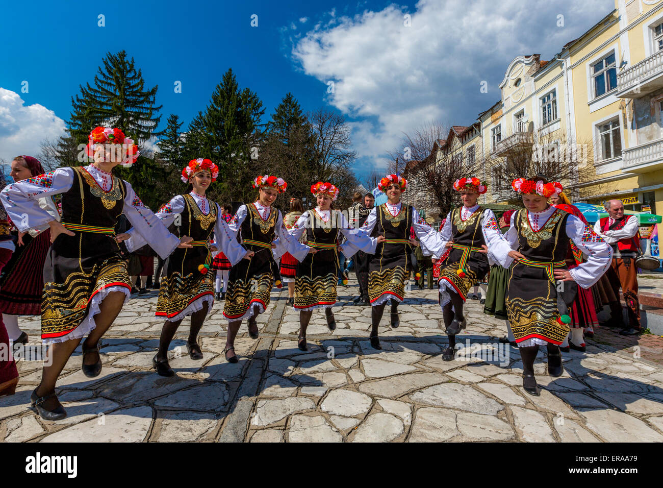 Female Bulgarian folklore dancers playing round dance during the ...