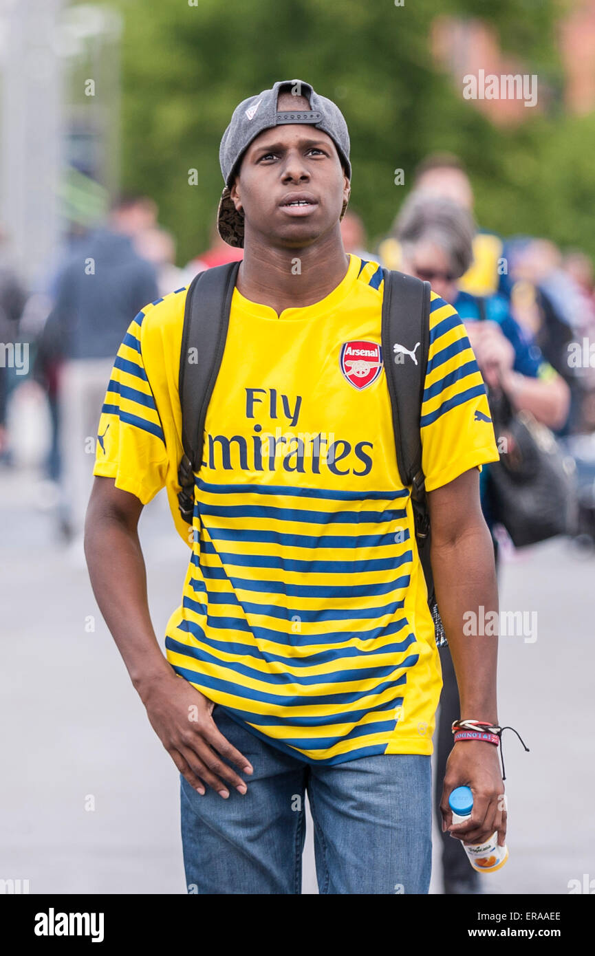 London, UK. 30 May 2015. An Arsenal supporter arrives, as fans gather ...