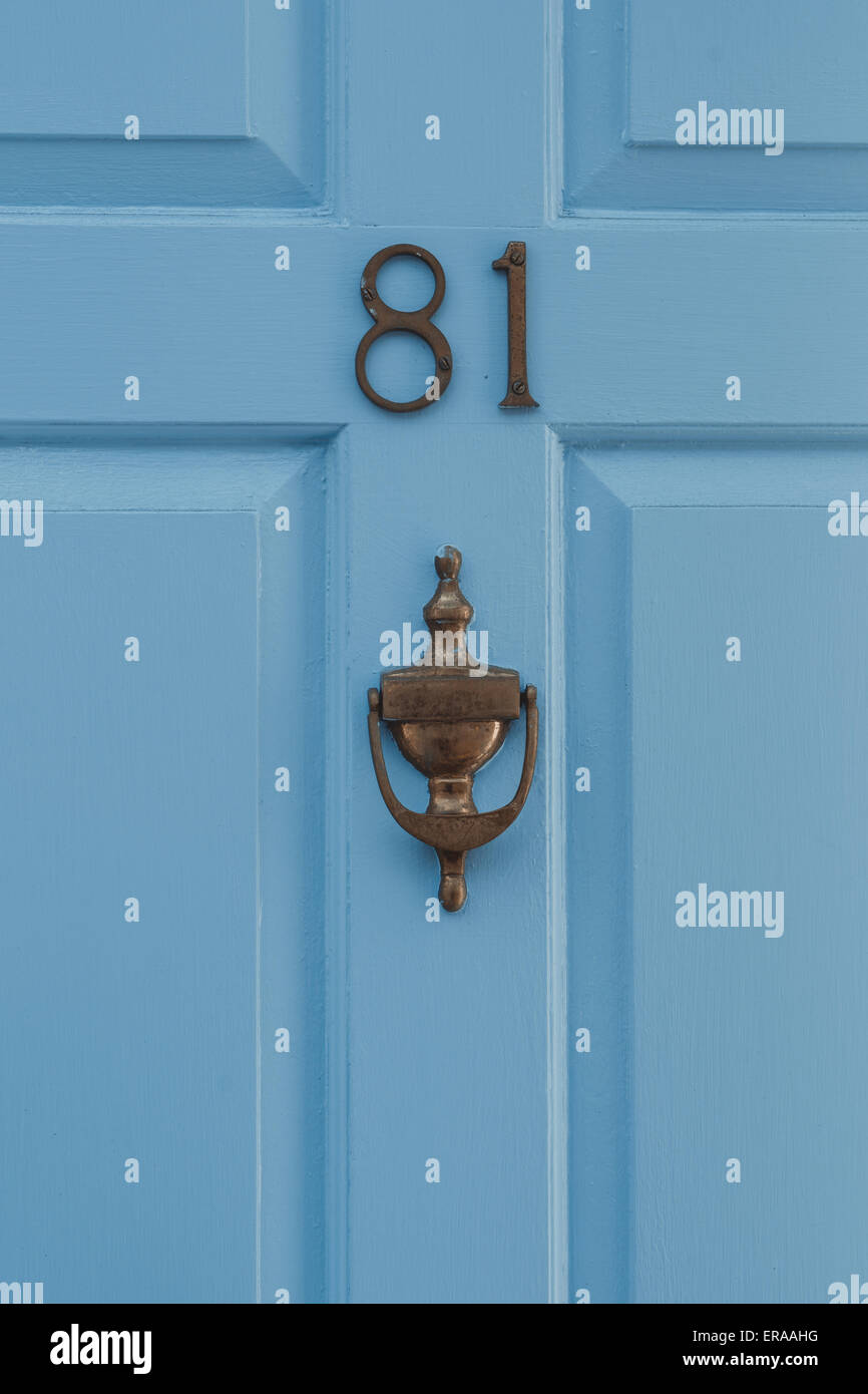 Eighty One 81 door number and knocker on blue painted wooden door ...