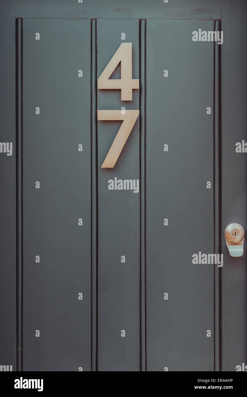 Door number 47 fourty seven vertical image closeup Stock Photo - Alamy