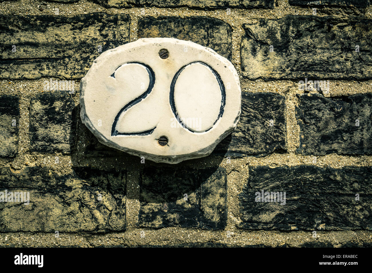 Number 20 twenty on brick wall vintage look details Stock Photo - Alamy