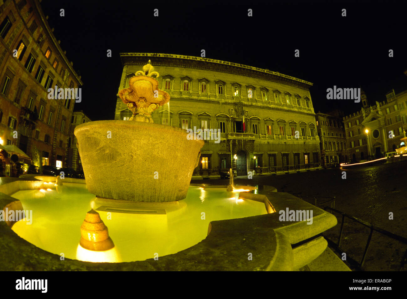 Italy, Rome, Piazza Farnese, fountain and Palazzo Farnese at night ...