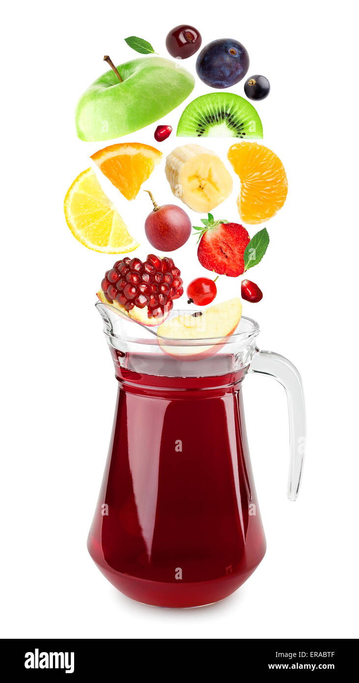 Fresh juice with mixed falling fruit on white background Stock Photo ...