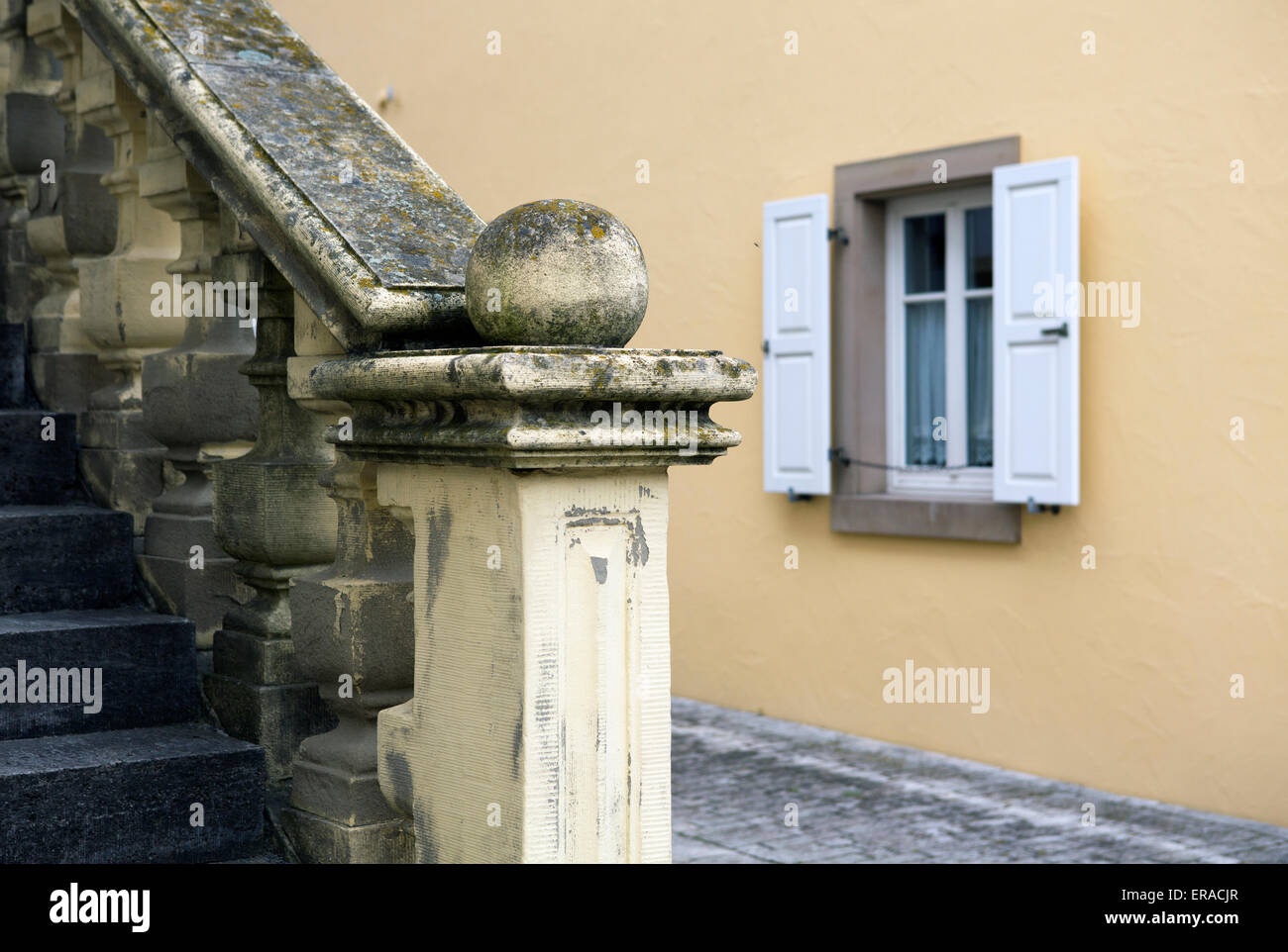 old historic staircase in front of a window with shutters Stock Photo ...