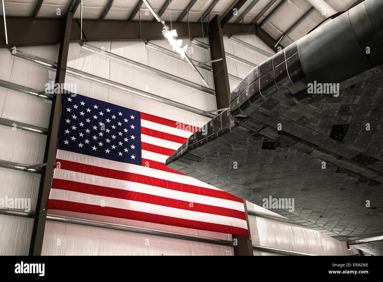 An image of a Space Shuttle wing and the US flag Stock Photo - Alamy