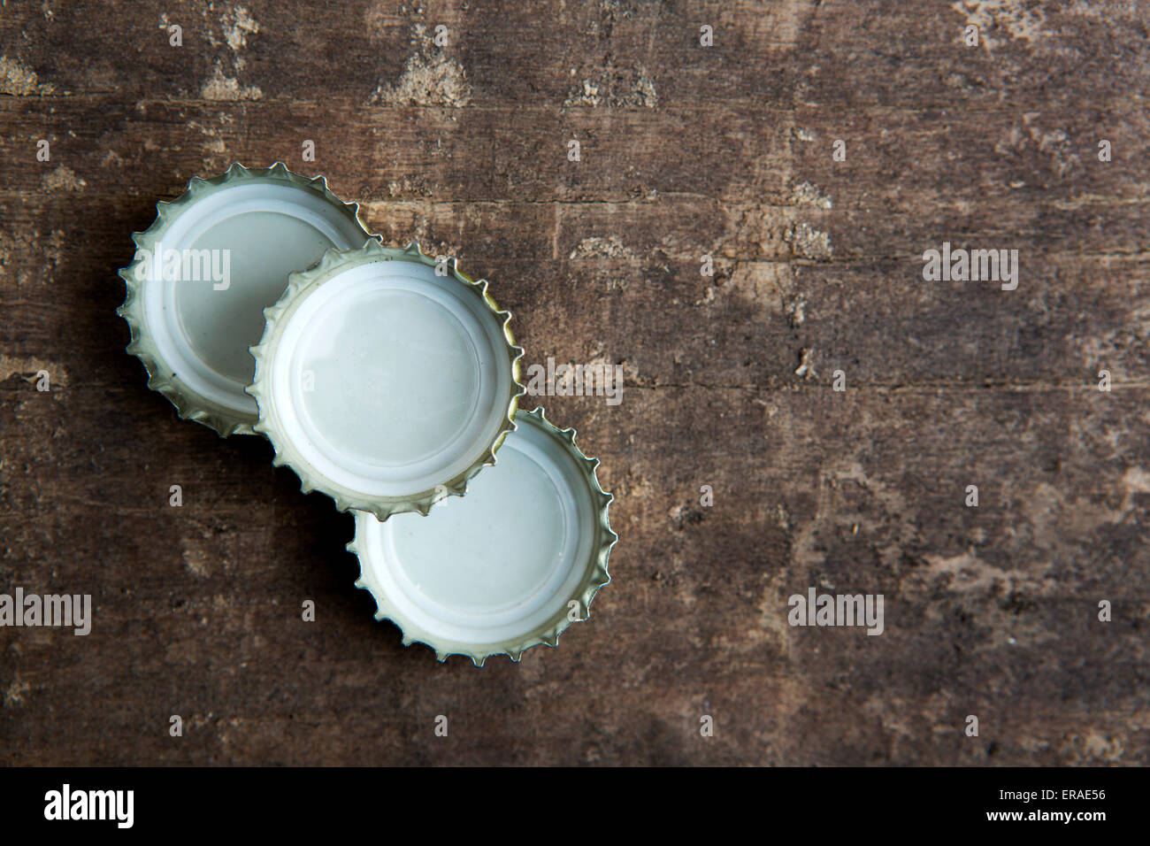 Three bottle caps on hi-res stock photography and images - Alamy
