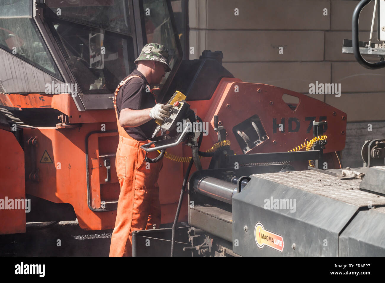 Saint-Petersburg, Russia - May 30, 2015: men at work, urban road under ...