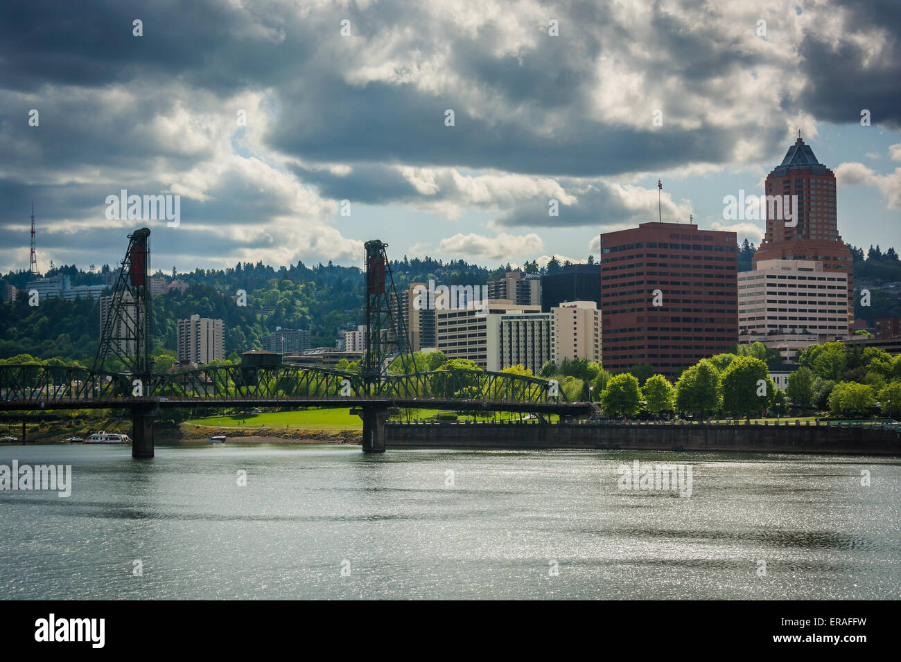 The Hawthorne Bridge over the Williamette River and buildings in ...