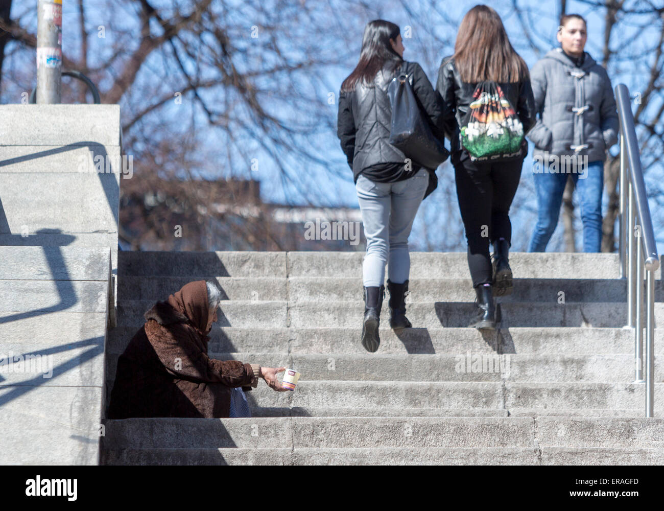 Helping homeless woman street hi-res stock photography and images - Alamy