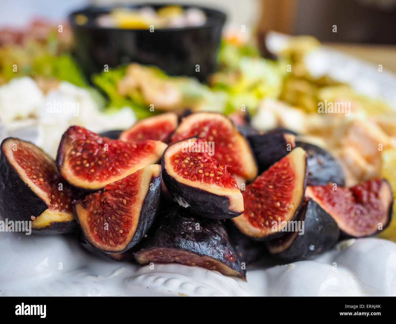 Delicious ripe figs in fruit salad, ready to serve Stock Photo - Alamy