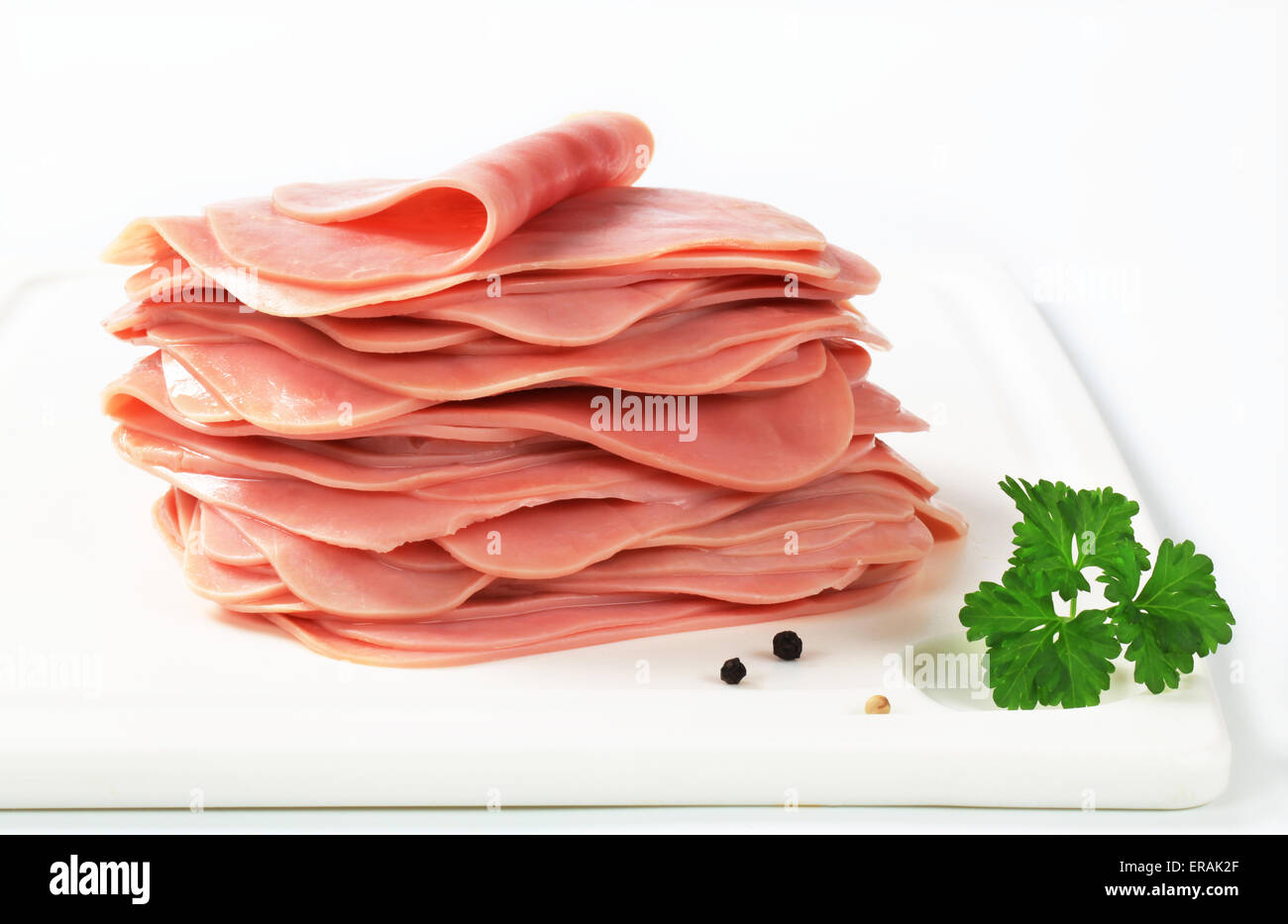 Stack of thinly sliced ham Stock Photo - Alamy