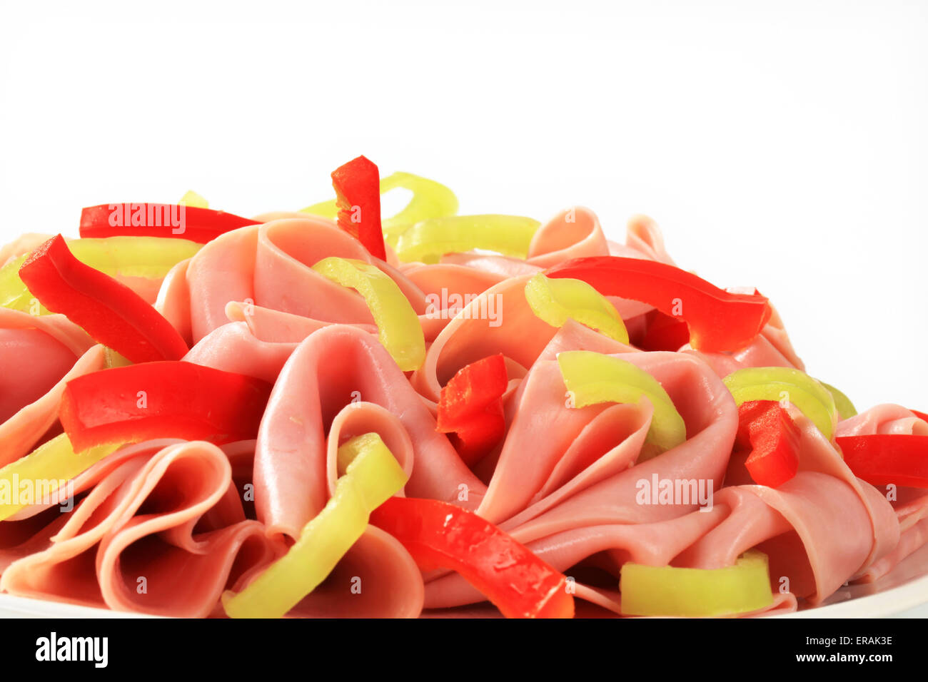 Thinly sliced ham and strips of fresh pepper Stock Photo - Alamy