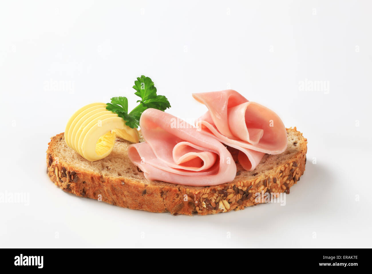 Slice of bread with ham Stock Photo - Alamy