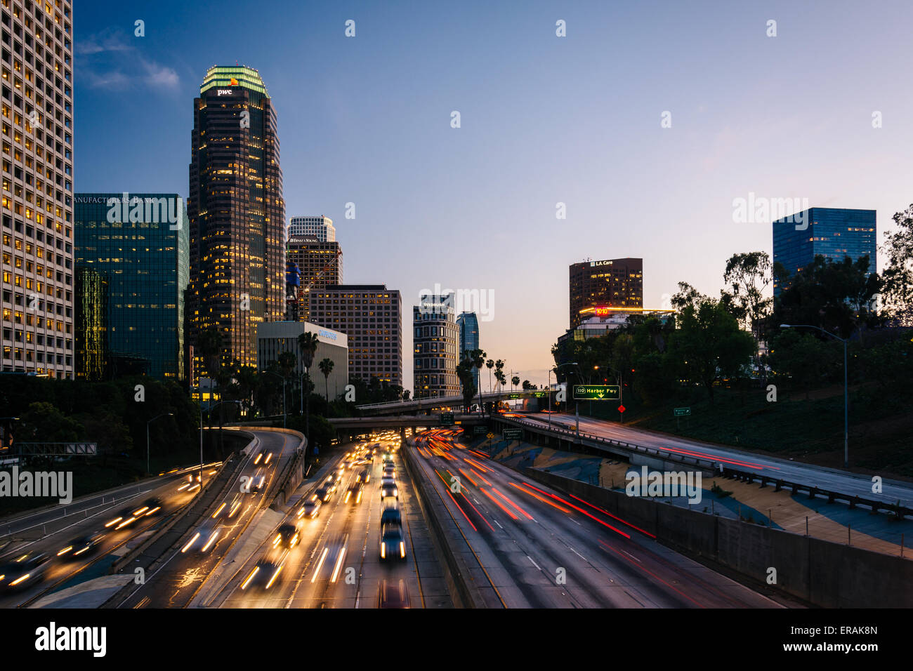 Traffic on the 110 Freeway and the Los Angeles Skyline at sunset, seen ...