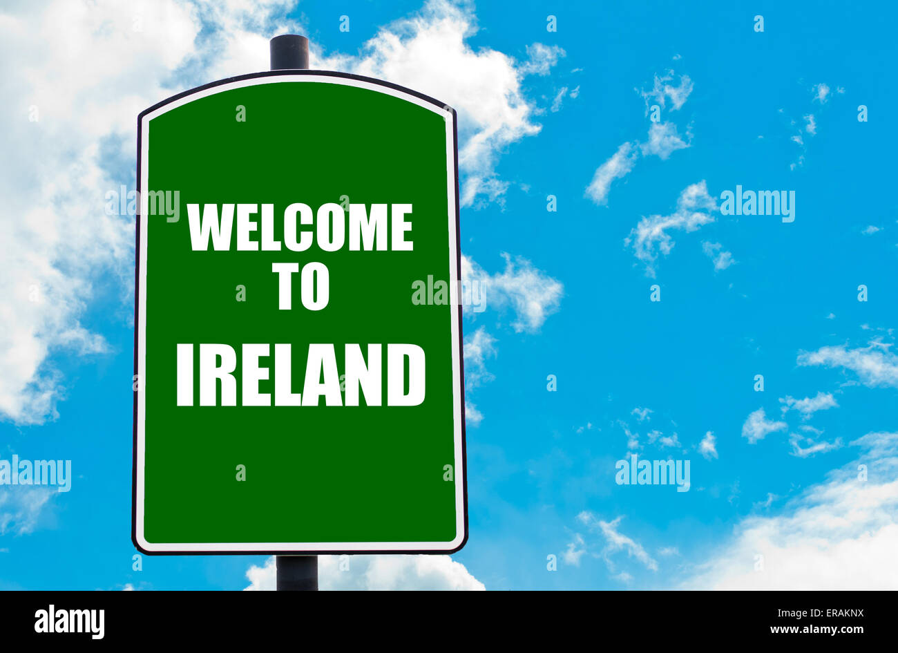 Green road sign with greeting message WELCOME TO IRELAND isolated over ...