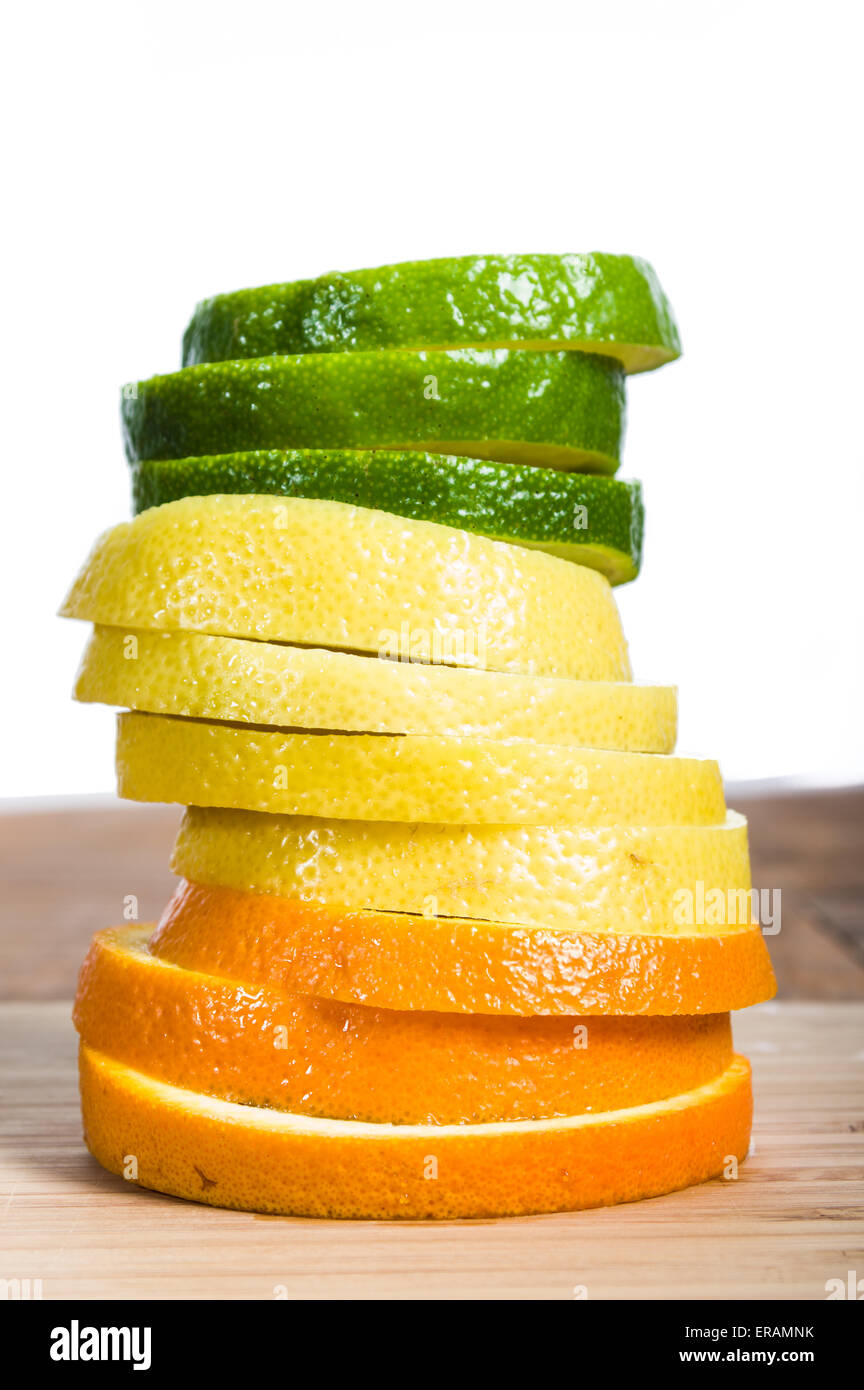 Stack of lemon, lime and orange slices Stock Photo - Alamy