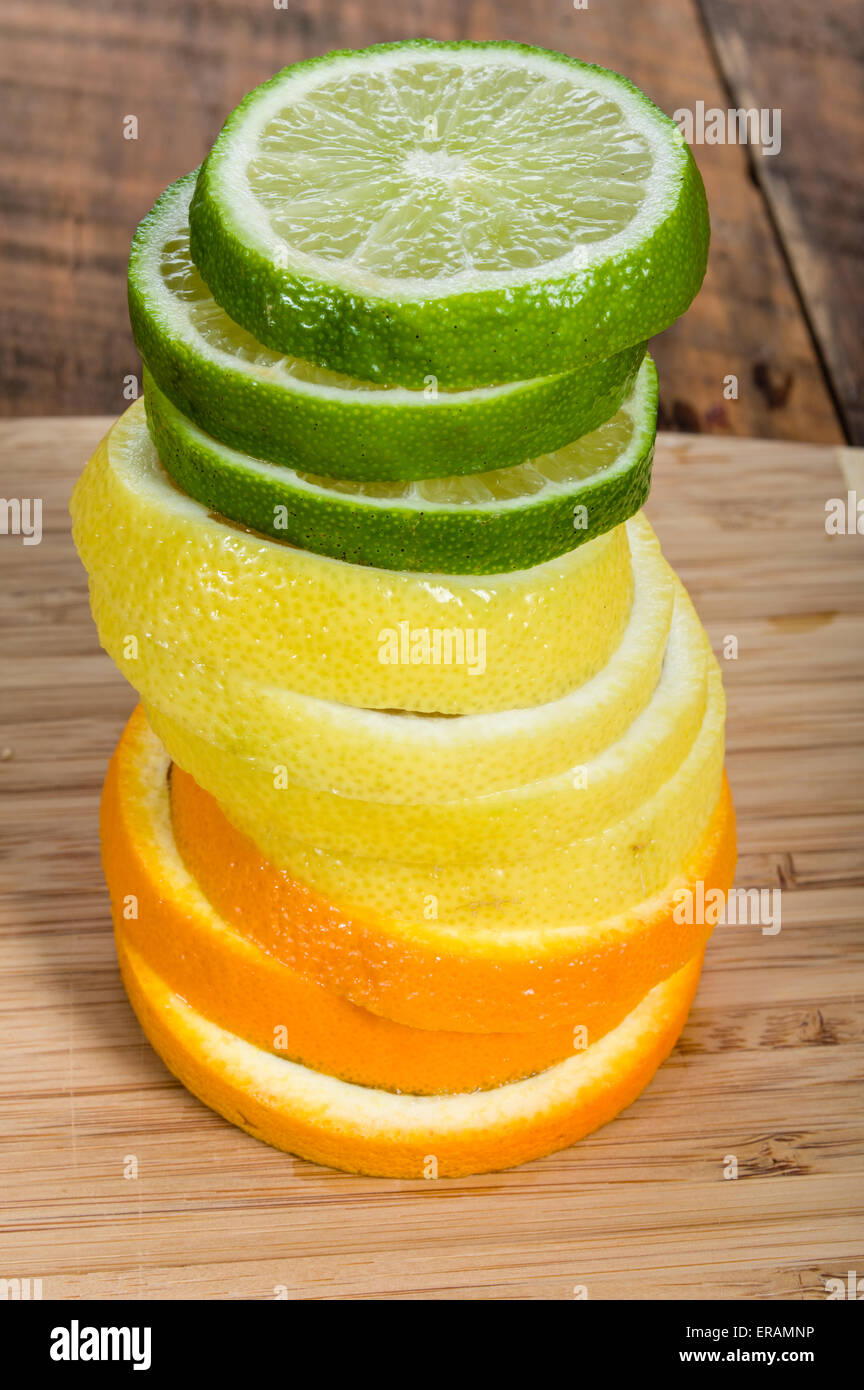 Stack of lemon, lime and orange slices Stock Photo - Alamy