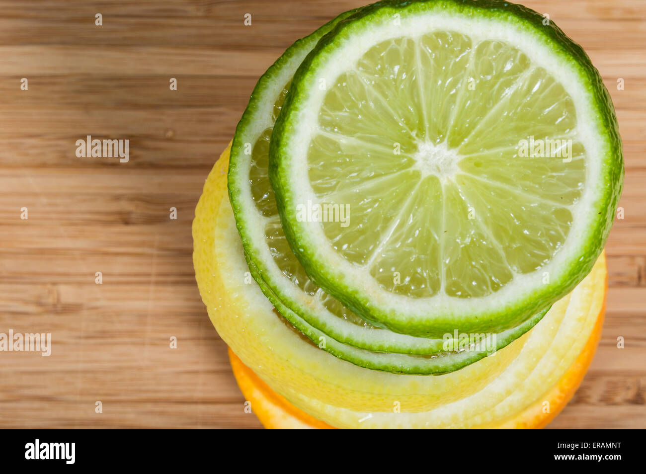 Stack of lemon, lime and orange slices Stock Photo - Alamy