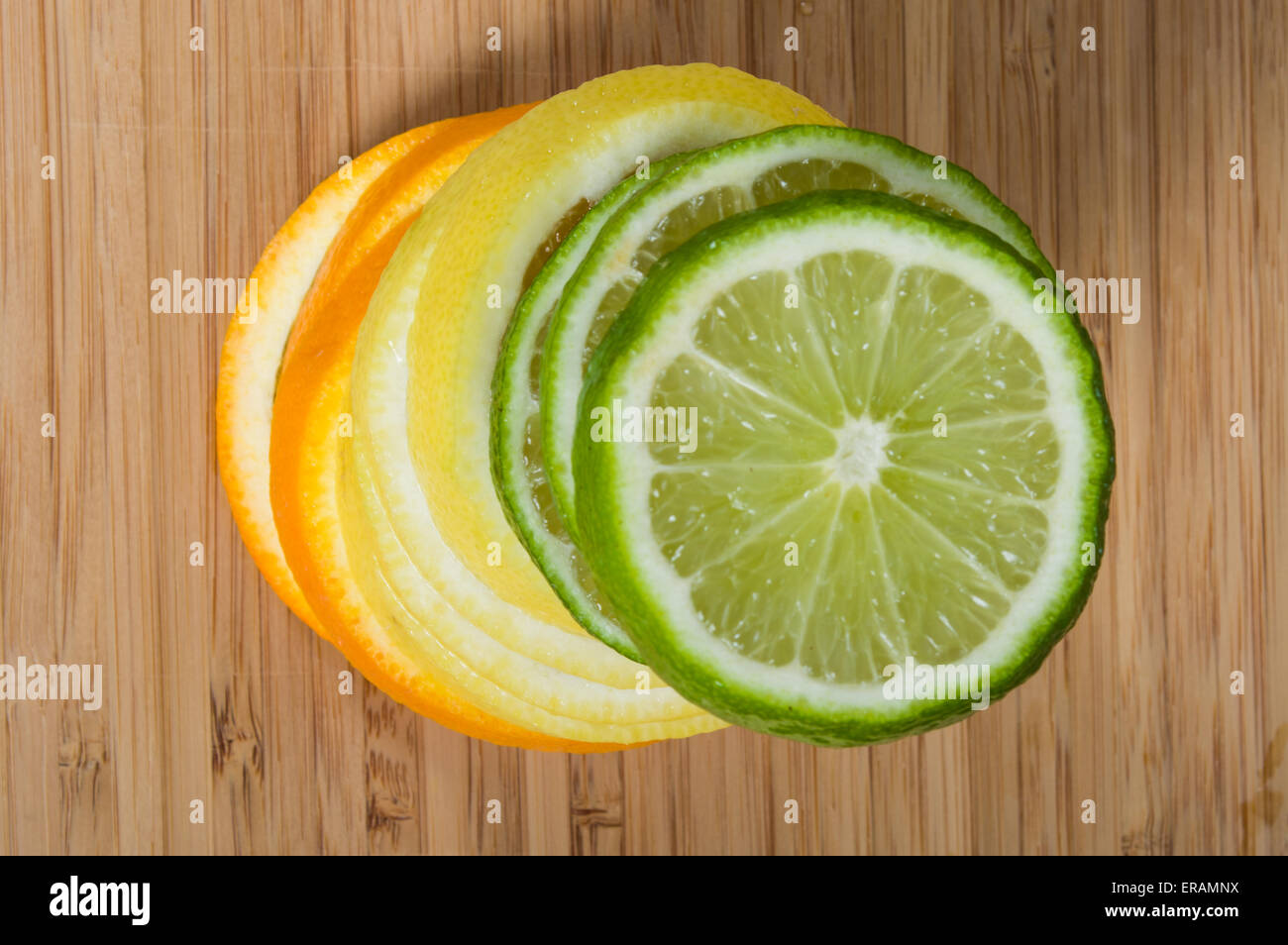 Stack of lemon, lime and orange slices Stock Photo - Alamy
