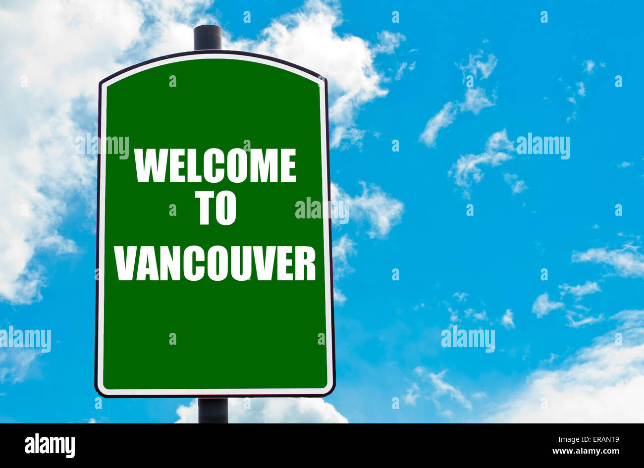 Green road sign with greeting message WELCOME TO VANCOUVER, CANADA ...