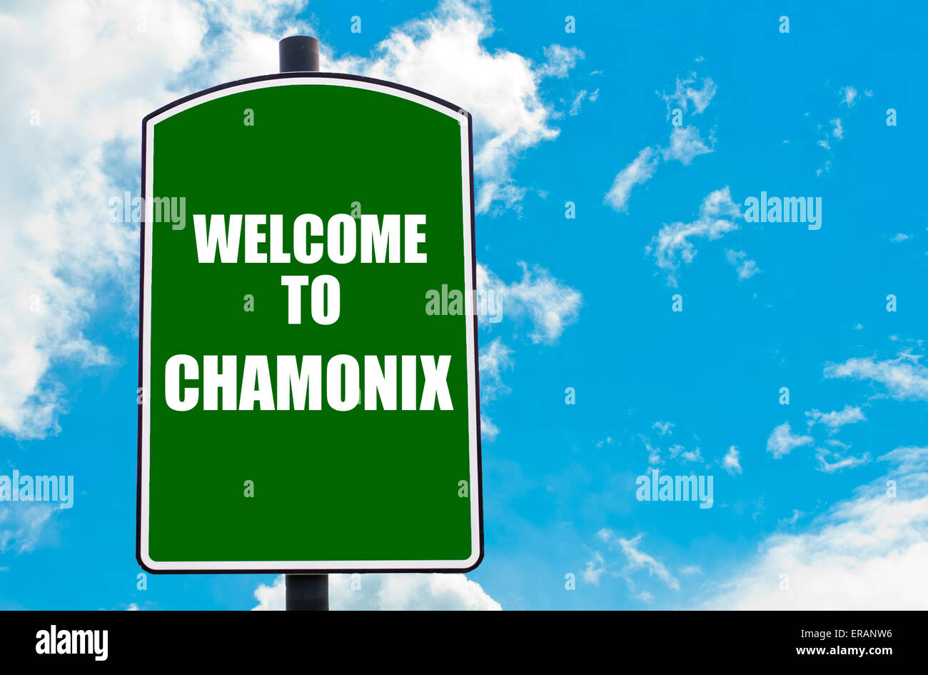 Green road sign with greeting message WELCOME TO CHAMONIX isolated over ...