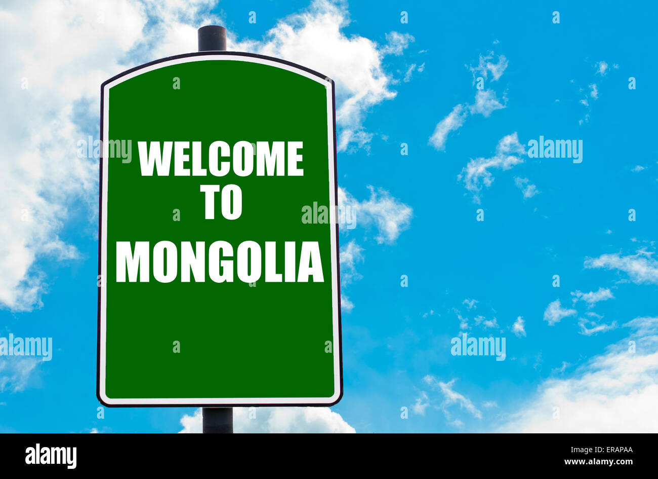 Green road sign with greeting message WELCOME TO MONGOLIA isolated over ...