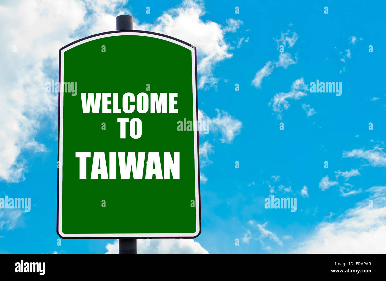 Green road sign with greeting message WELCOME TO TAIWAN isolated over ...