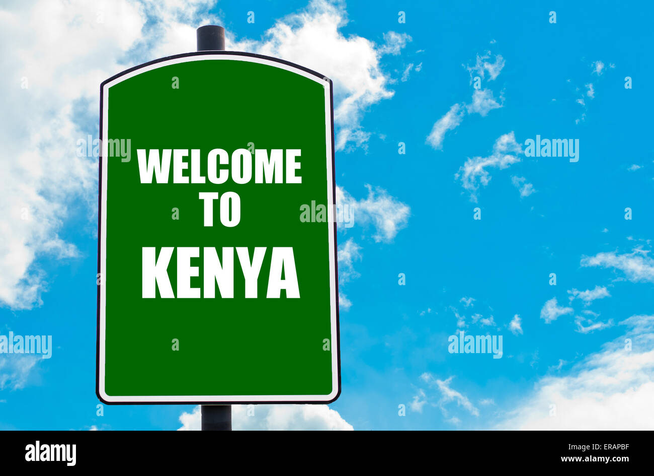 Green road sign with greeting message WELCOME TO KENYA isolated over ...