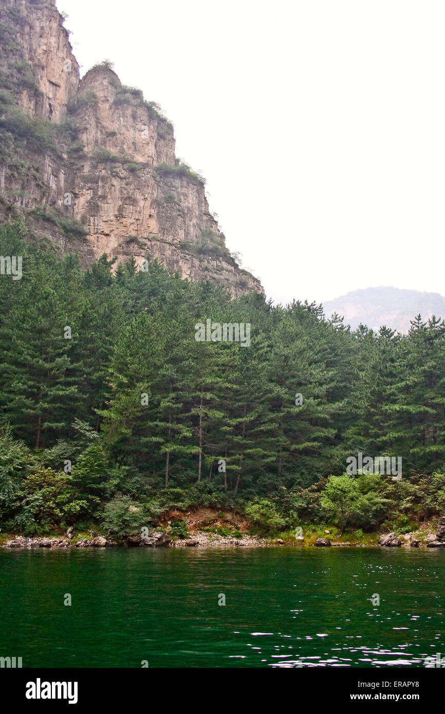 Steep high cliffs and the river at the bottom of the gorge Stock Photo ...