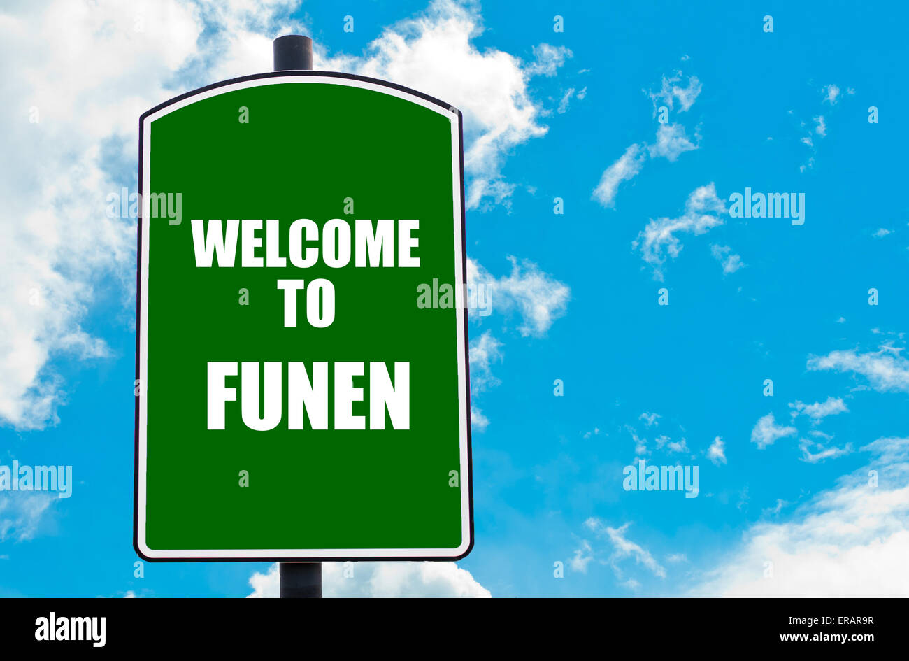 Green road sign with greeting message WELCOME TO FUNEN isolated over ...