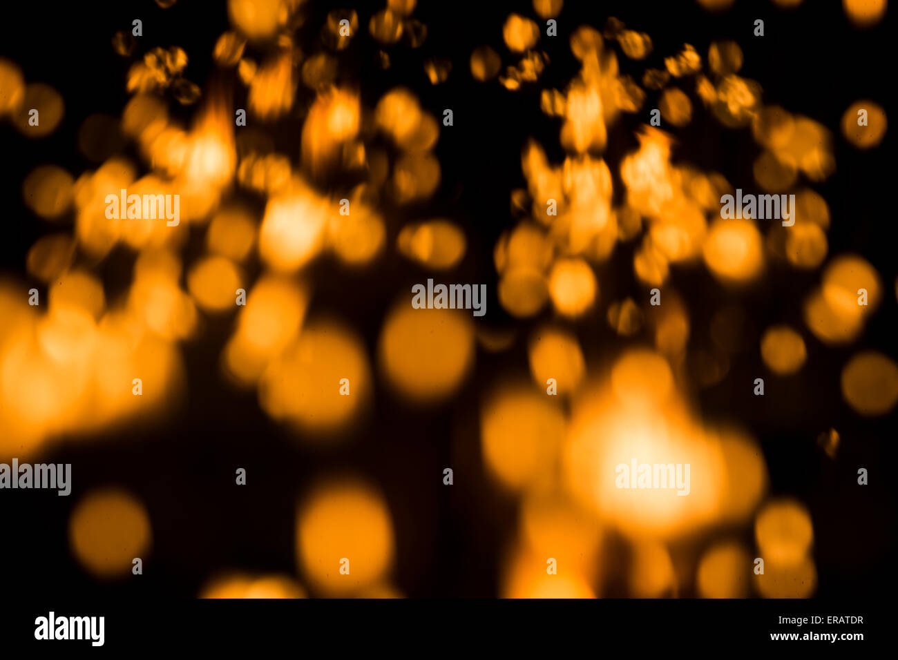 Many blured candle lights. Blured fire lights Stock Photo - Alamy
