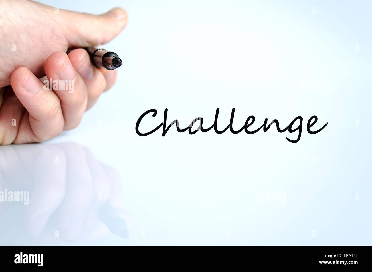 Pen in the hand isolated over white background Challenge Concept Stock ...
