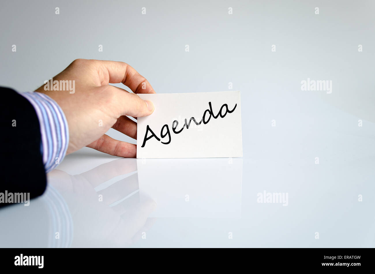 Business man hand writing Agenda Stock Photo - Alamy