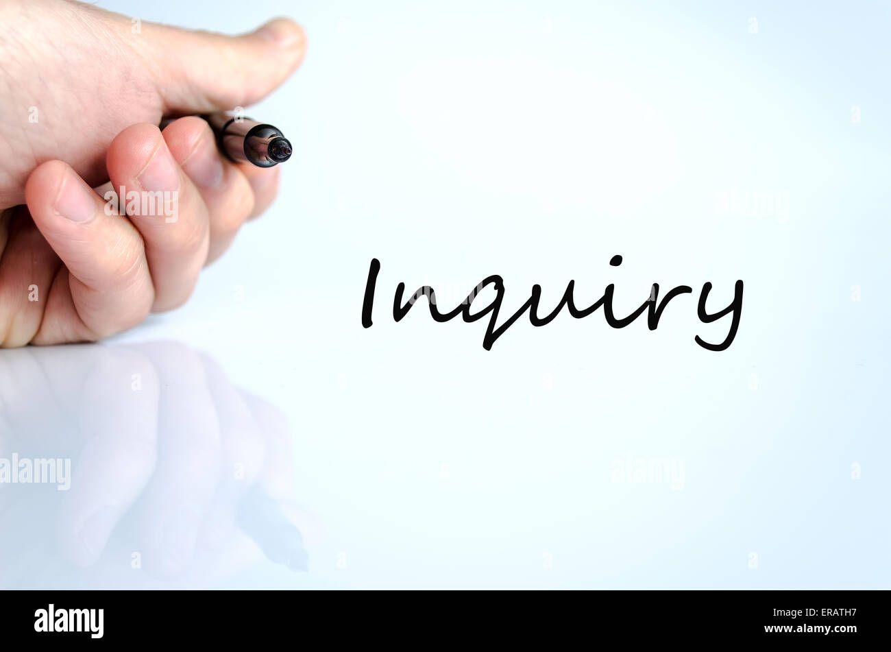 Pen in the hand isolated over white background Inquiry concept Stock ...