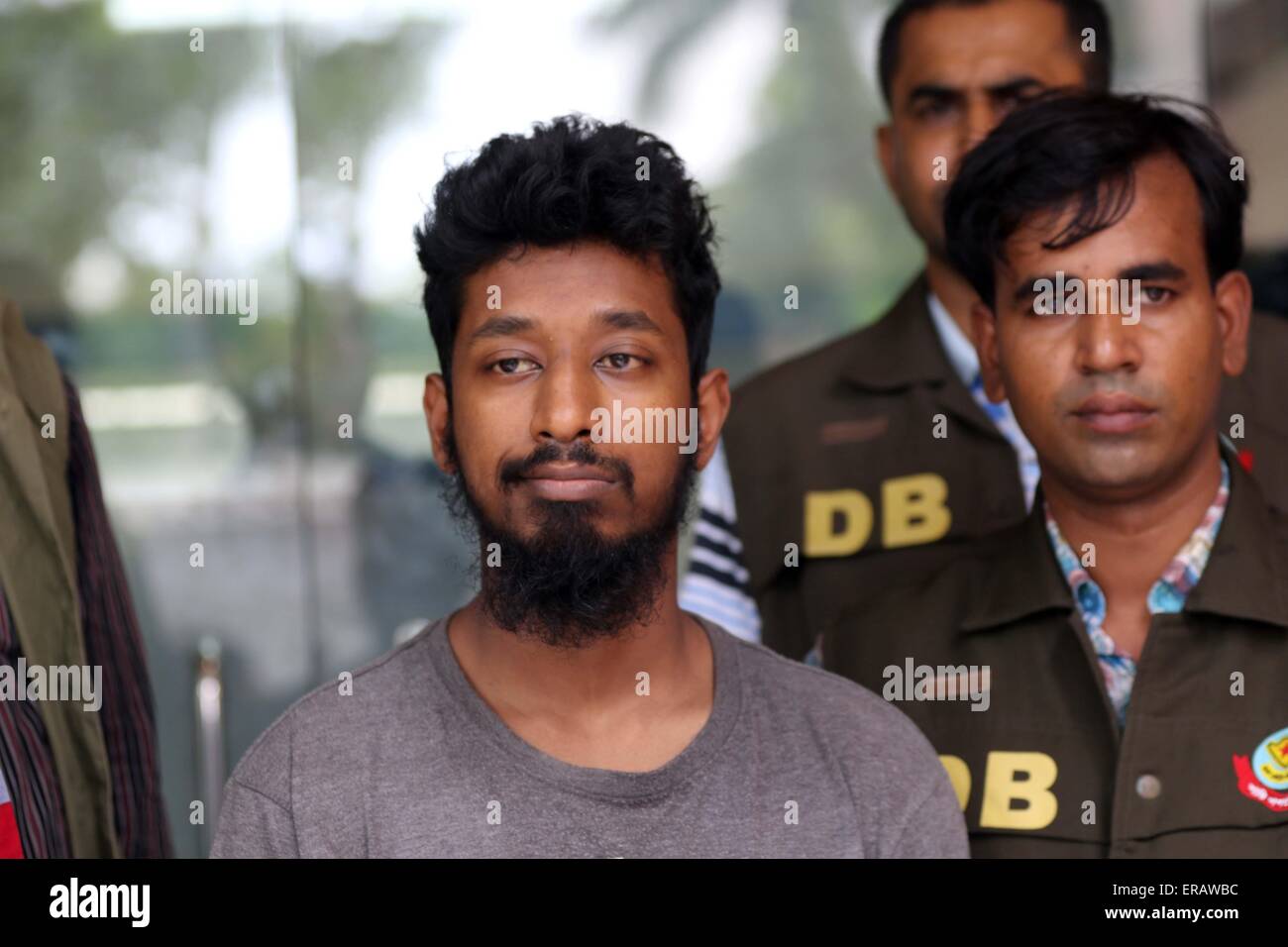 Dhaka, Bangladesh. 31st May, 2015. Detectives produce the suspected ...