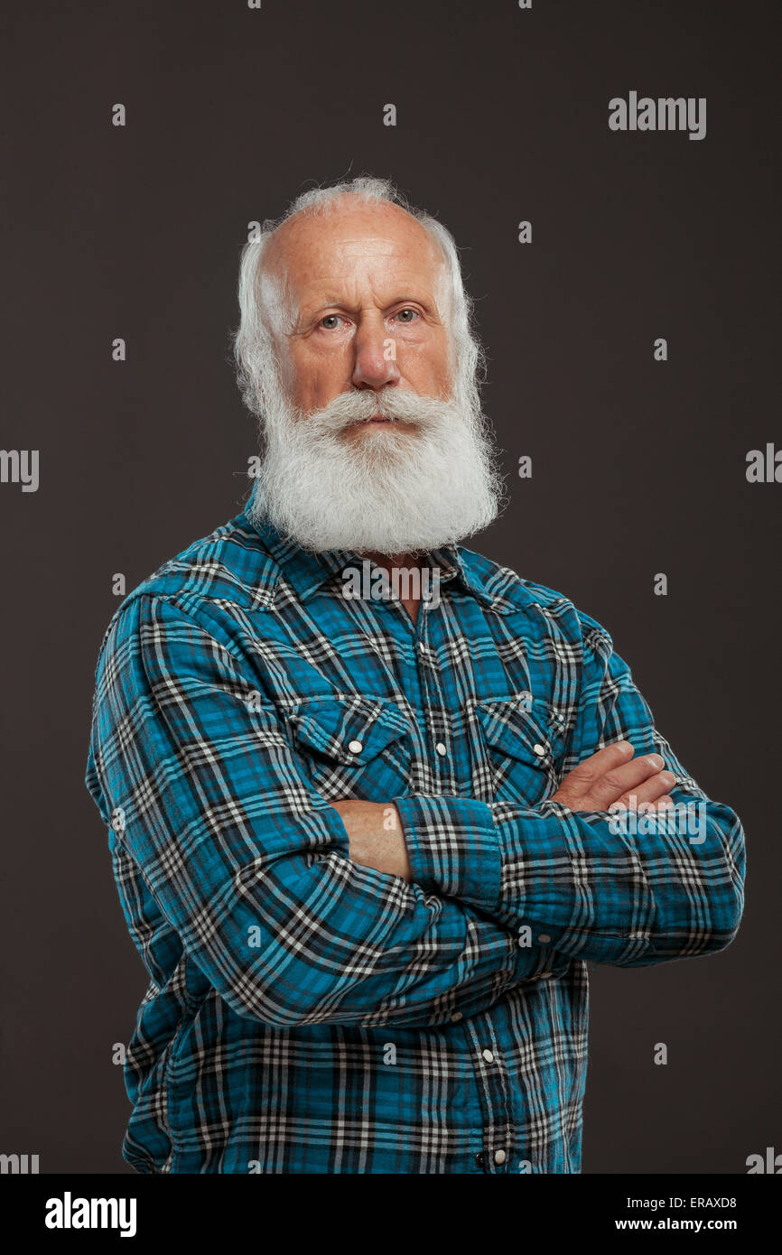 Old man with a beard and dark shirt hi-res stock photography and images ...