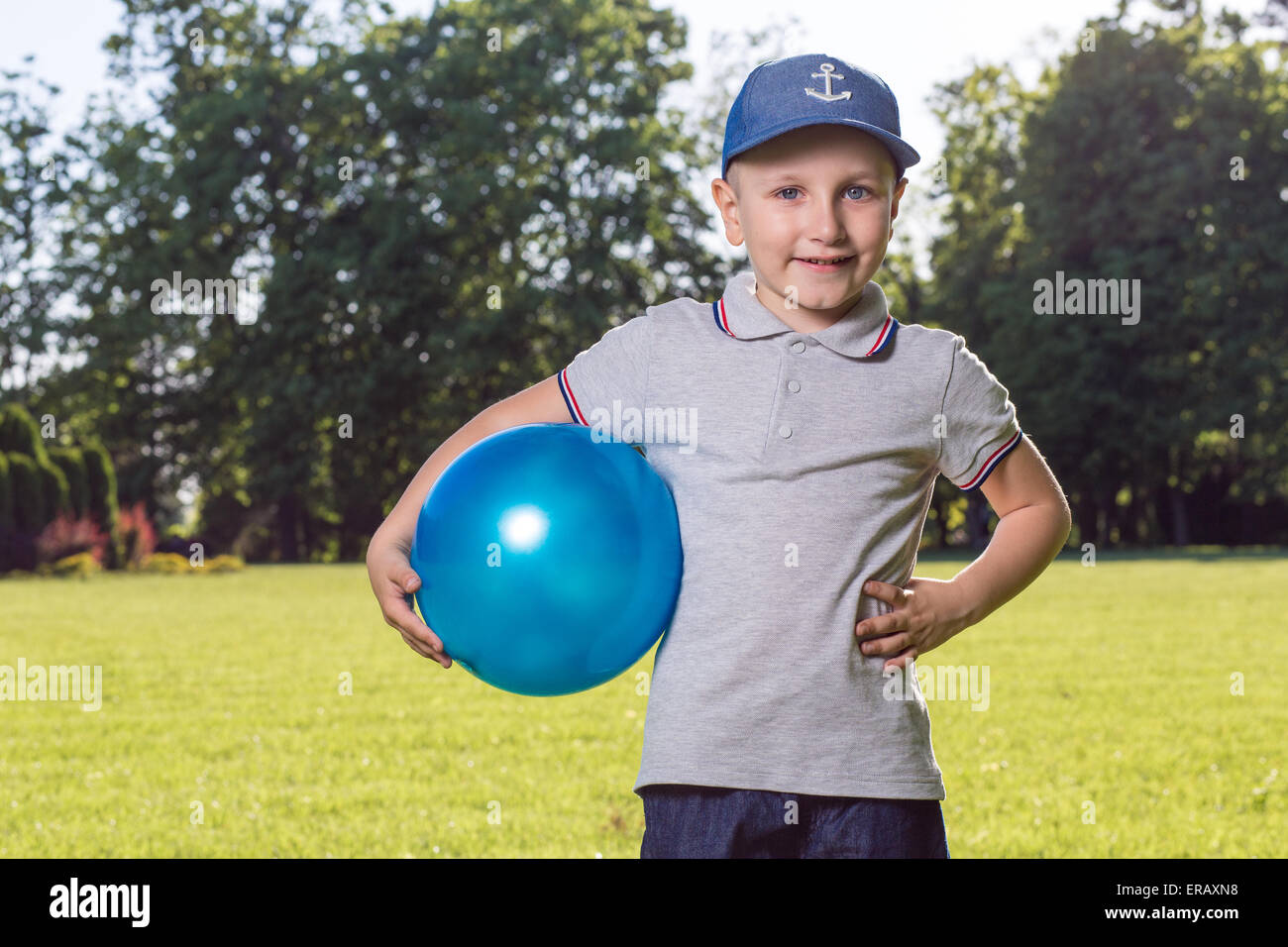Boy children playing ball Stock Photo - Alamy